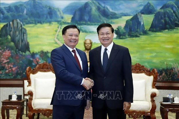 Top leader of Laos applauds Hanoi - Vientiane cooperation
