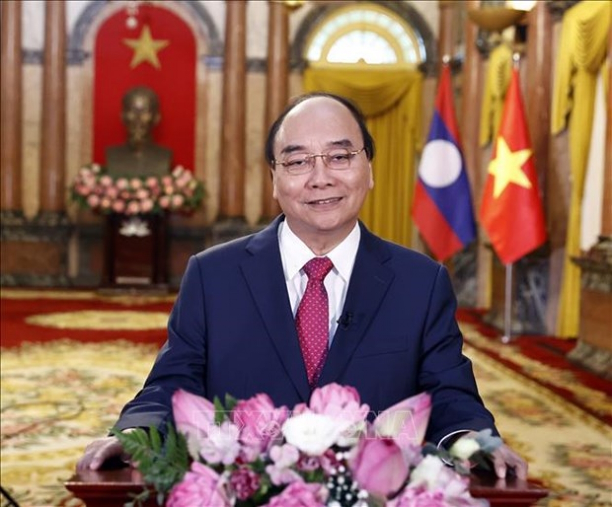 Presidents of Vietnam and Laos praise bilateral friendship
